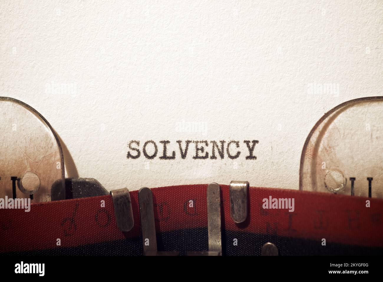 Solvency text written with a typewriter Stock Photo - Alamy