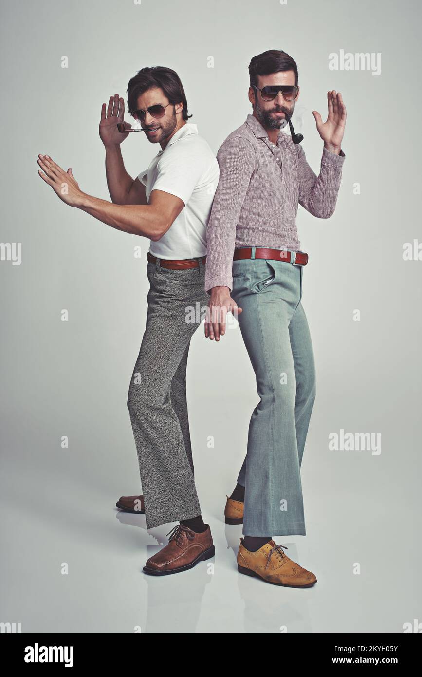 Stepped a bit too close... AAAAAAAAAND hes gone. Studio shot of two men ...