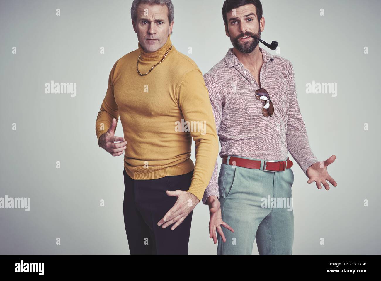 Aliens Us Were totally from here.....Studio shot of two men standing ...