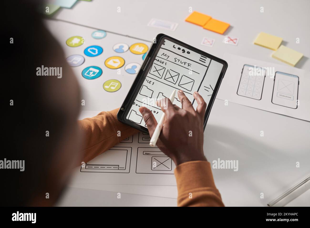 UX drawing sketch of new mobile app interface on tablet computer Stock ...