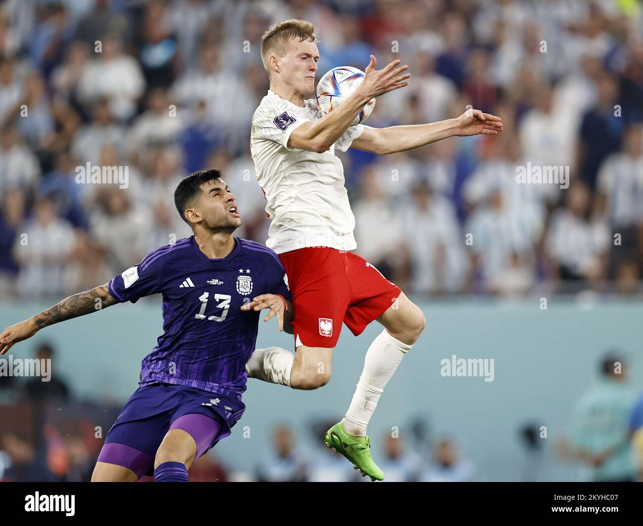 DOHA - (l-r) Cristian Romero of Argentina, Karol Swiderski of Poland ...