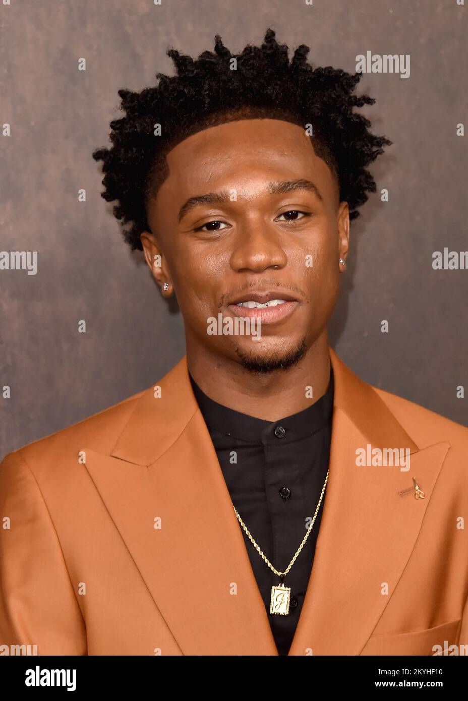 Jabbar Lewis walking the red carpet at the premiere for Apple Original ...