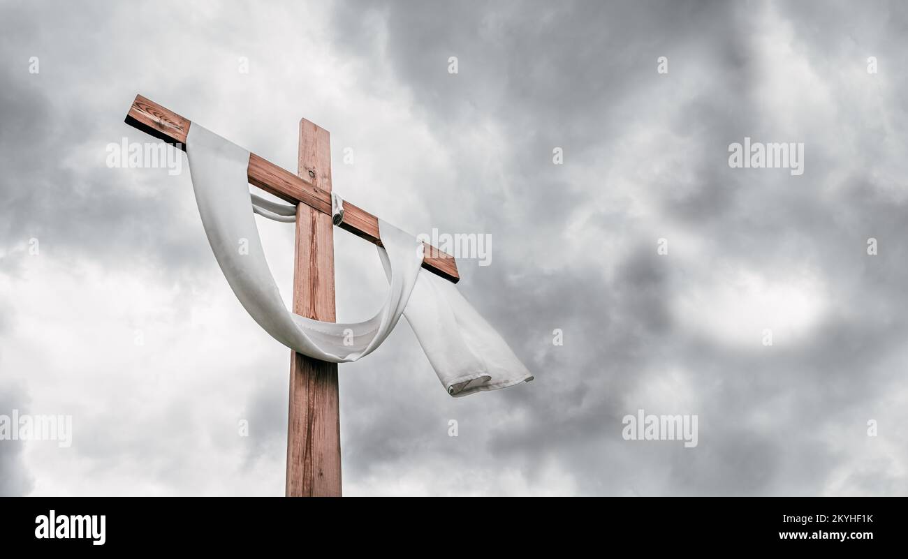 Christian cross on grey cloudy sky background announces Jesus's rising ...