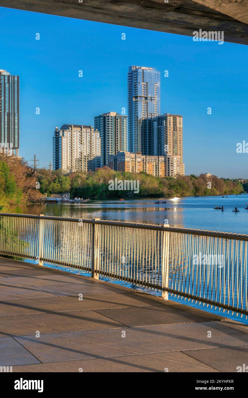 Austin, Texas- Views of boats on Colorado River and high-rise buildings ...