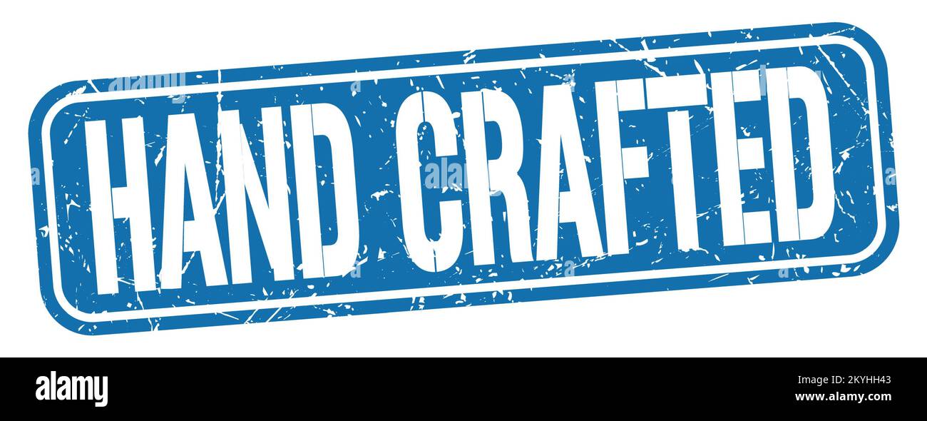 HAND CRAFTED text written on blue grungy stamp sign Stock Photo - Alamy