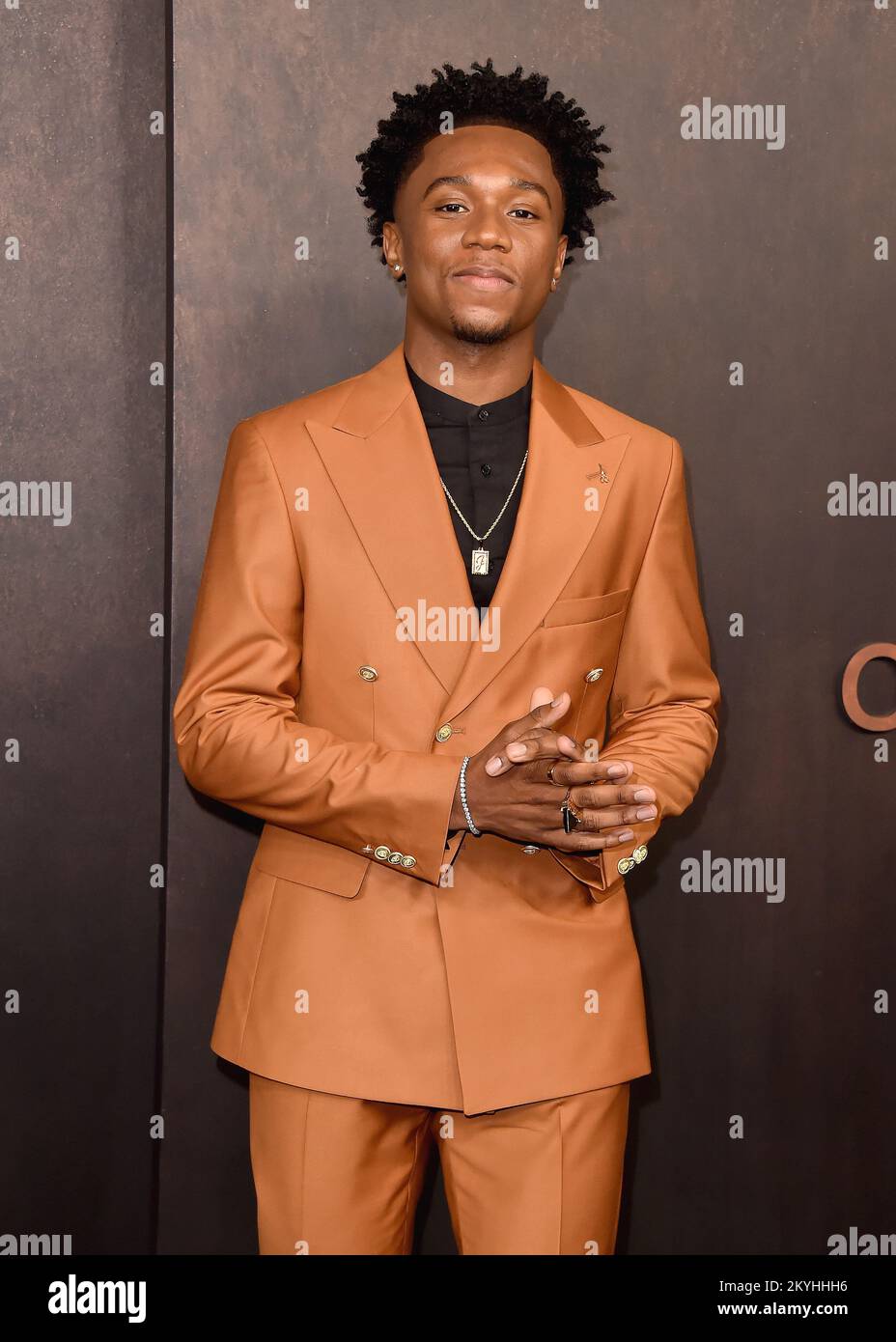 Jabbar Lewis walking the red carpet at the premiere for Apple Original ...