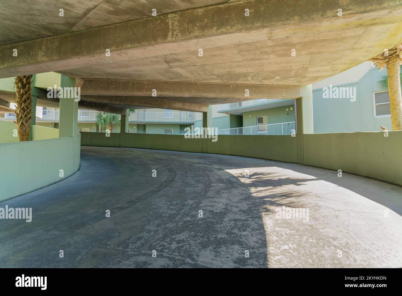 Destin, Florida- Curved car ramp on a parking garage building. Open ...