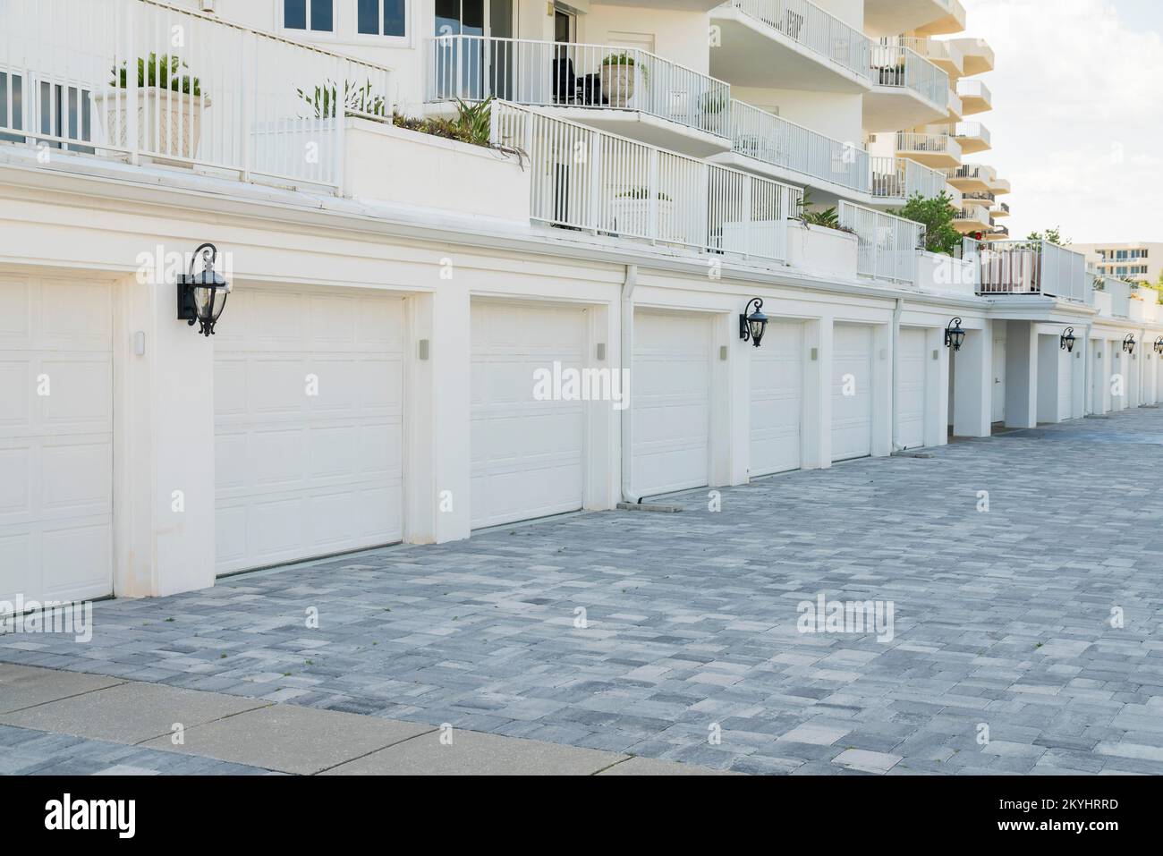 Destin, Florida- Attached garages with white doors and antique wall ...