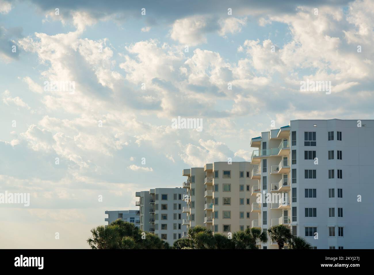 Side view of apartment buildings with balconies at the front in Destin ...