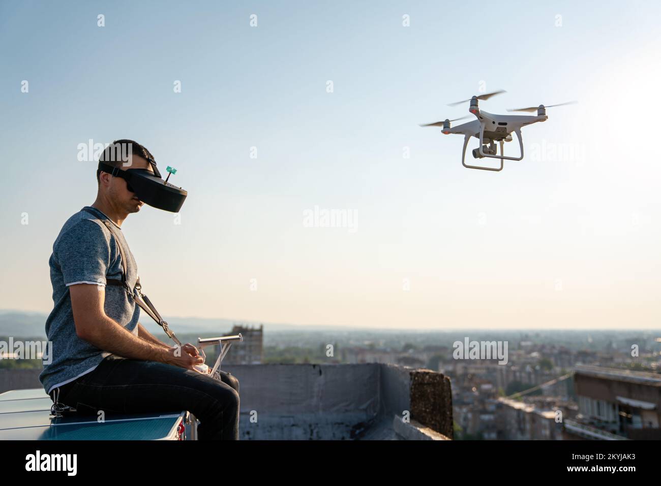 Young man with drone and virtual reality viewer Stock Photo - Alamy