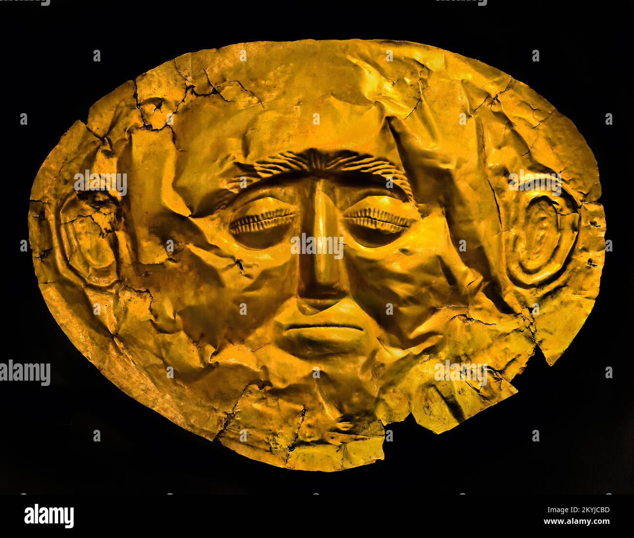 Embossing tomb iv circle a funerary mask in gold foil hi-res stock ...