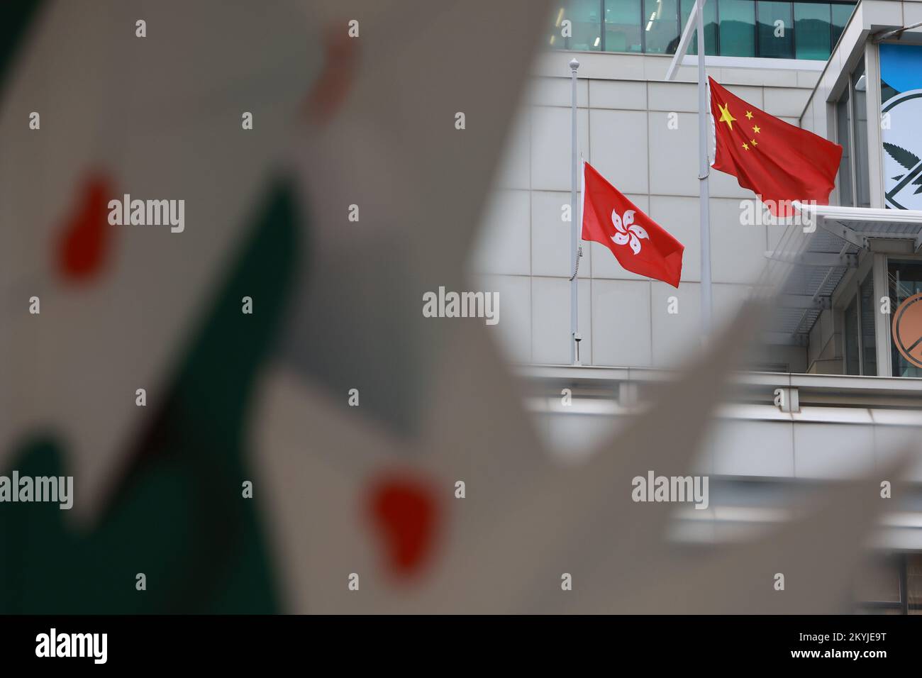 Hong Kong, Hong Kong, China. 1st Dec, 2022. Hong Kong SAR flag (Left ...