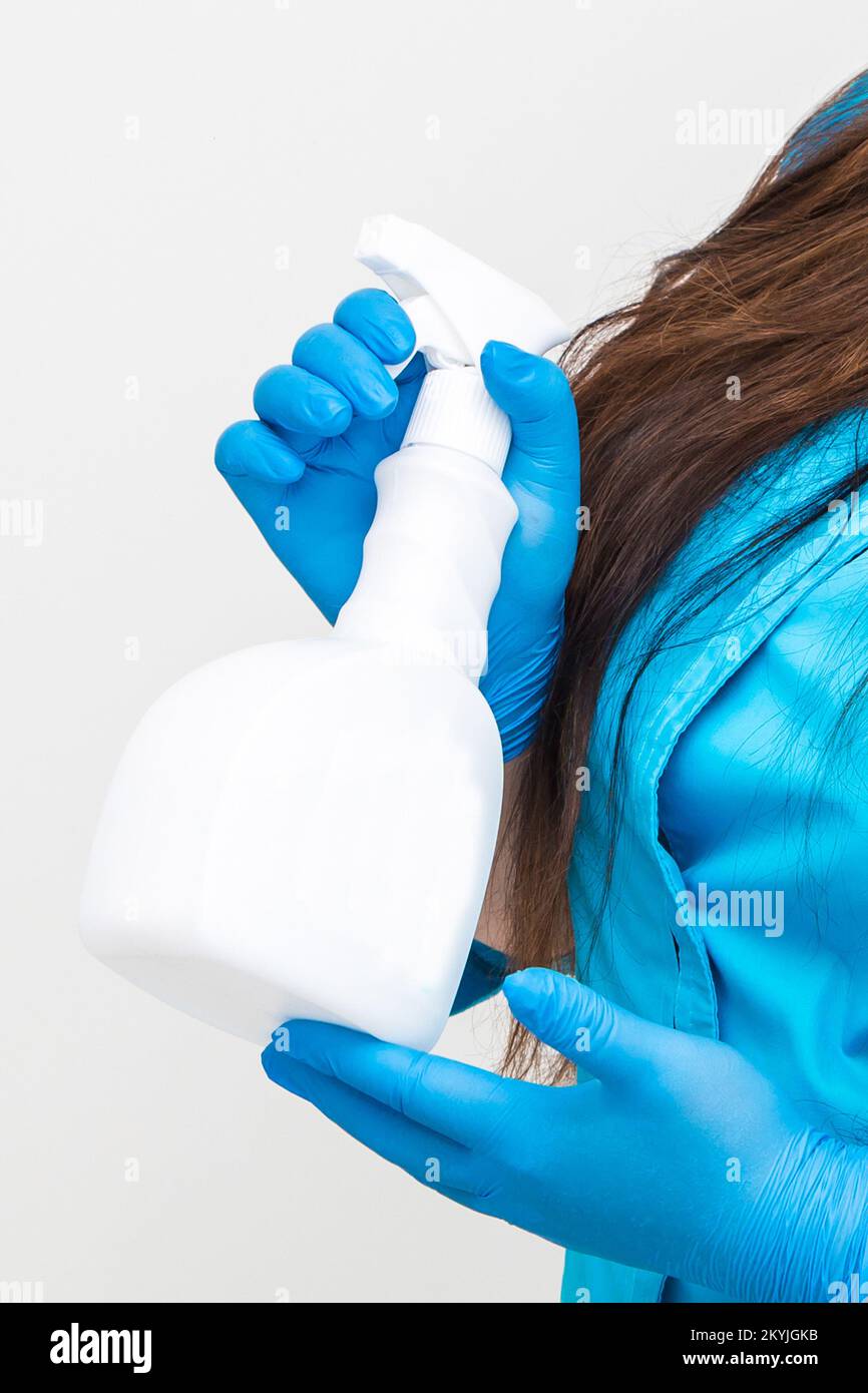 Hand holding antiseptic antibacterial disinfectant isolated on white ...