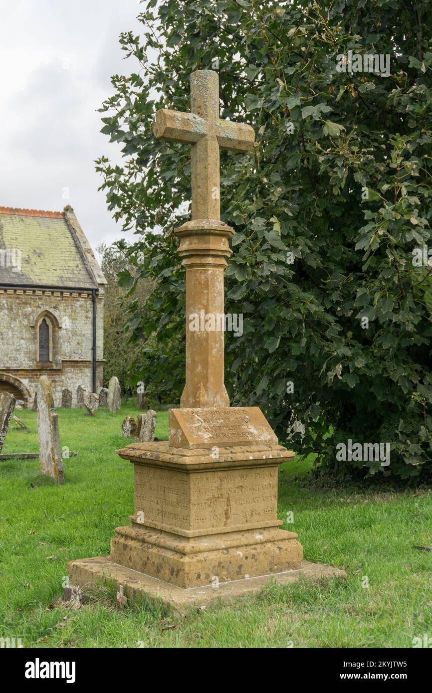 War memorial to the fallen of WW1 and WW2 in the churchyard of St Luke ...