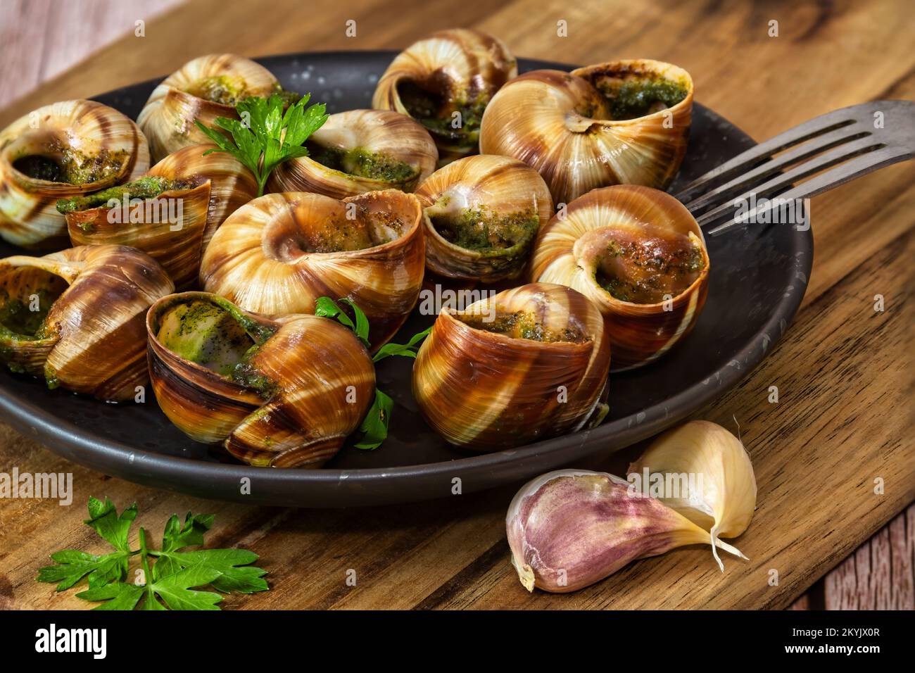 Cooked Burgundy Snails - Escargots de Bourgogne Stock Photo - Alamy