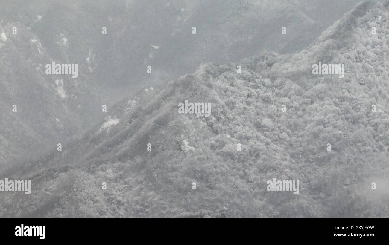 Aerial photo shows the snow scenery near the drainage divide of Qinling ...