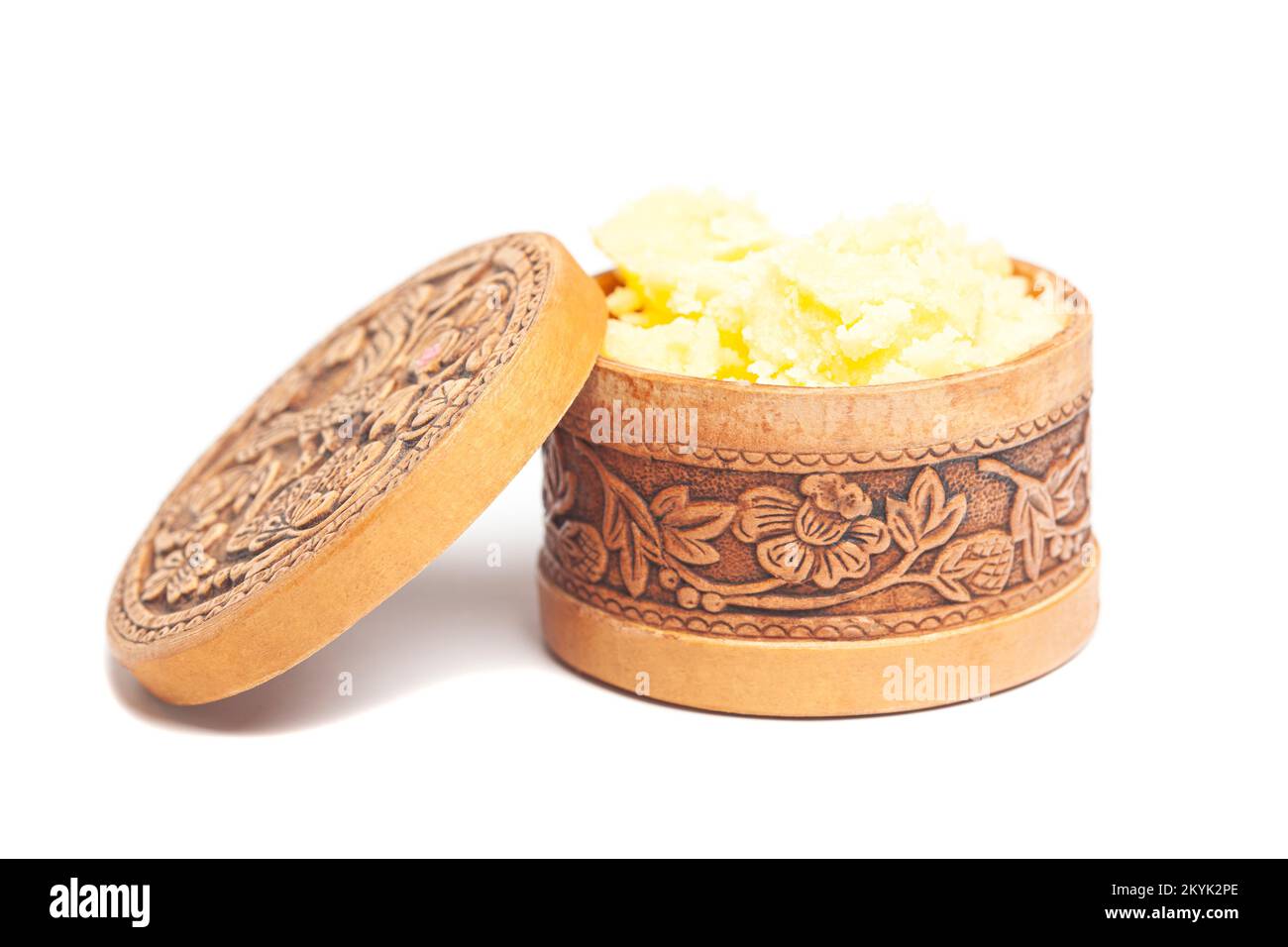 Ghee in wooden bowl isolated on white background Stock Photo - Alamy