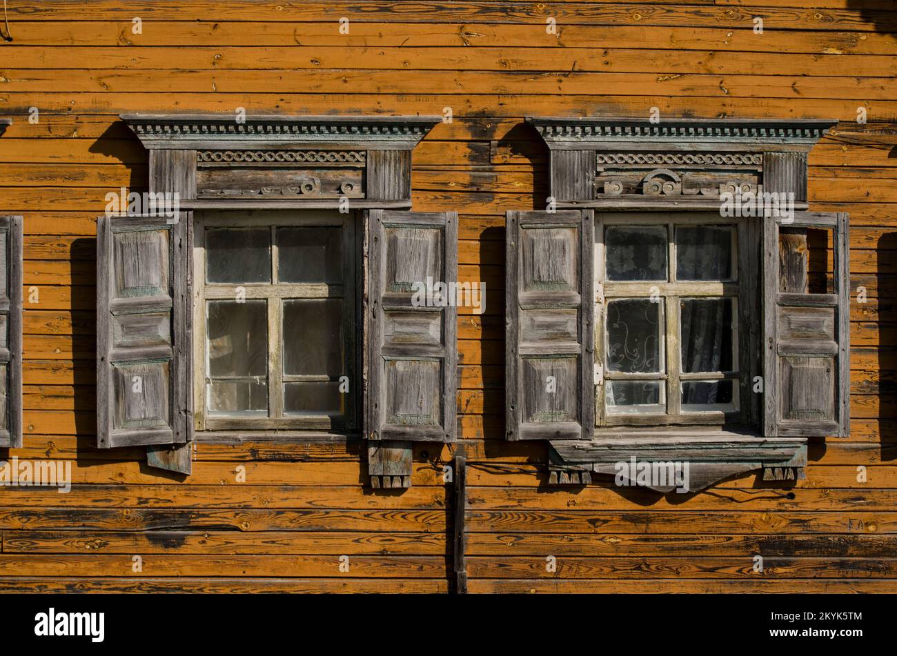 Windows with beautiful wooden architraves Stock Photo - Alamy