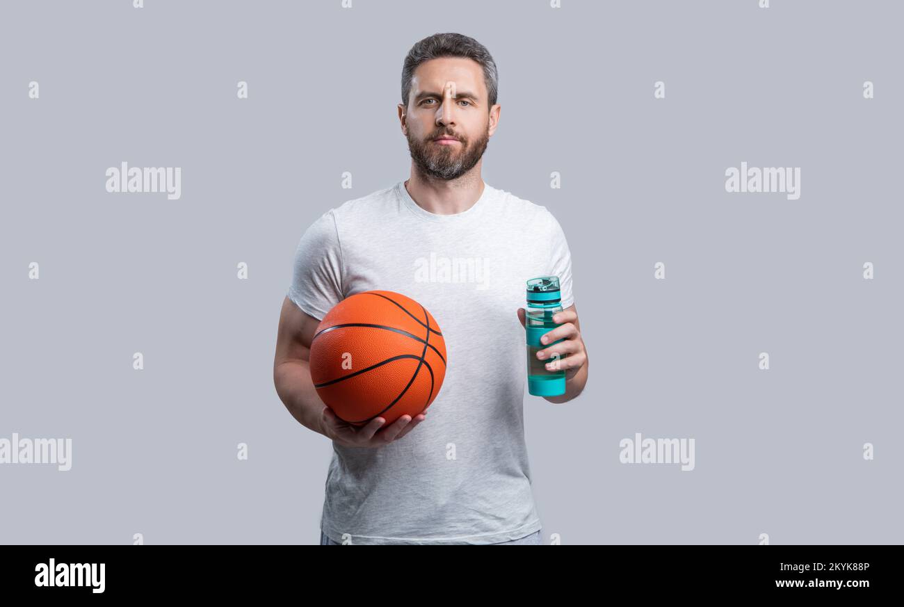 sport man basketball player drinking water. photo of sport man ...