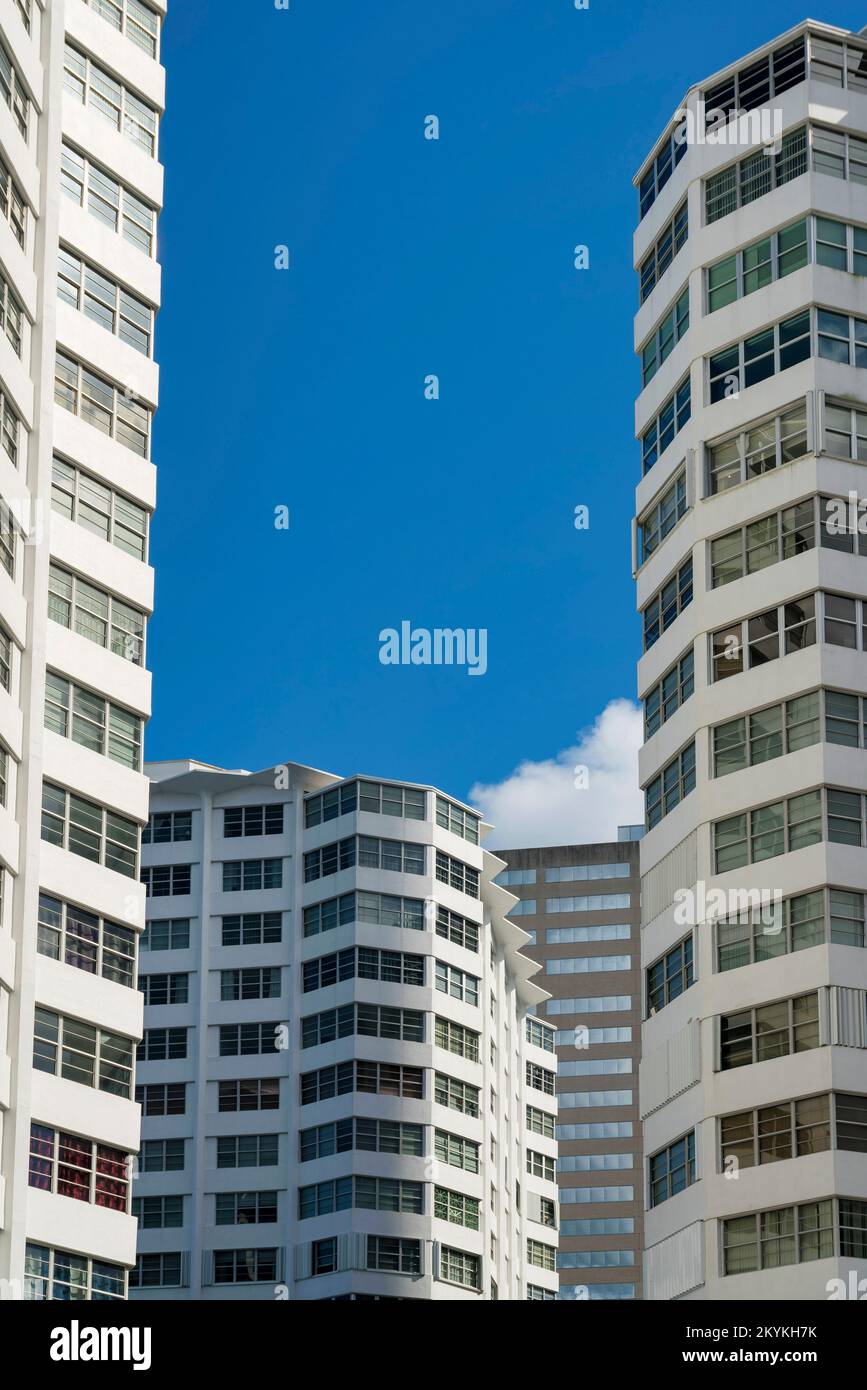 Facade of buildings at Miami, Florida with paned windows. There are ...