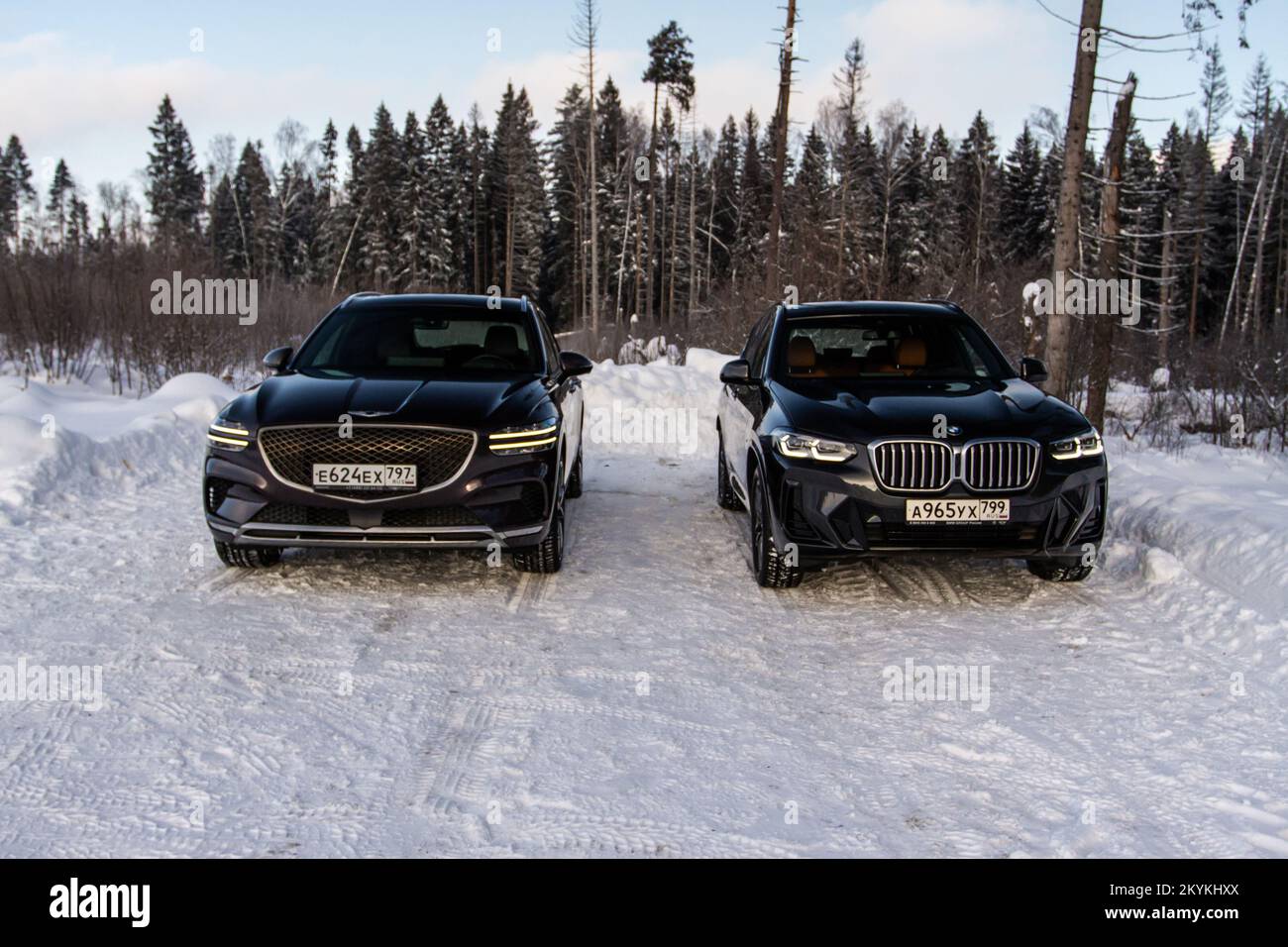 MOSCOW, RUSSIA - FEBRUARY 05, 2022 BMW X3 (G01) and Genesis GV70 (JK1 ...