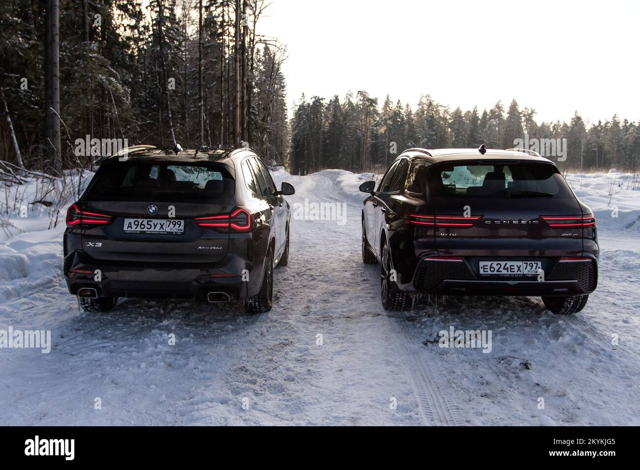 MOSCOW, RUSSIA - FEBRUARY 05, 2022 BMW X3 (G01) and Genesis GV70 (JK1 ...