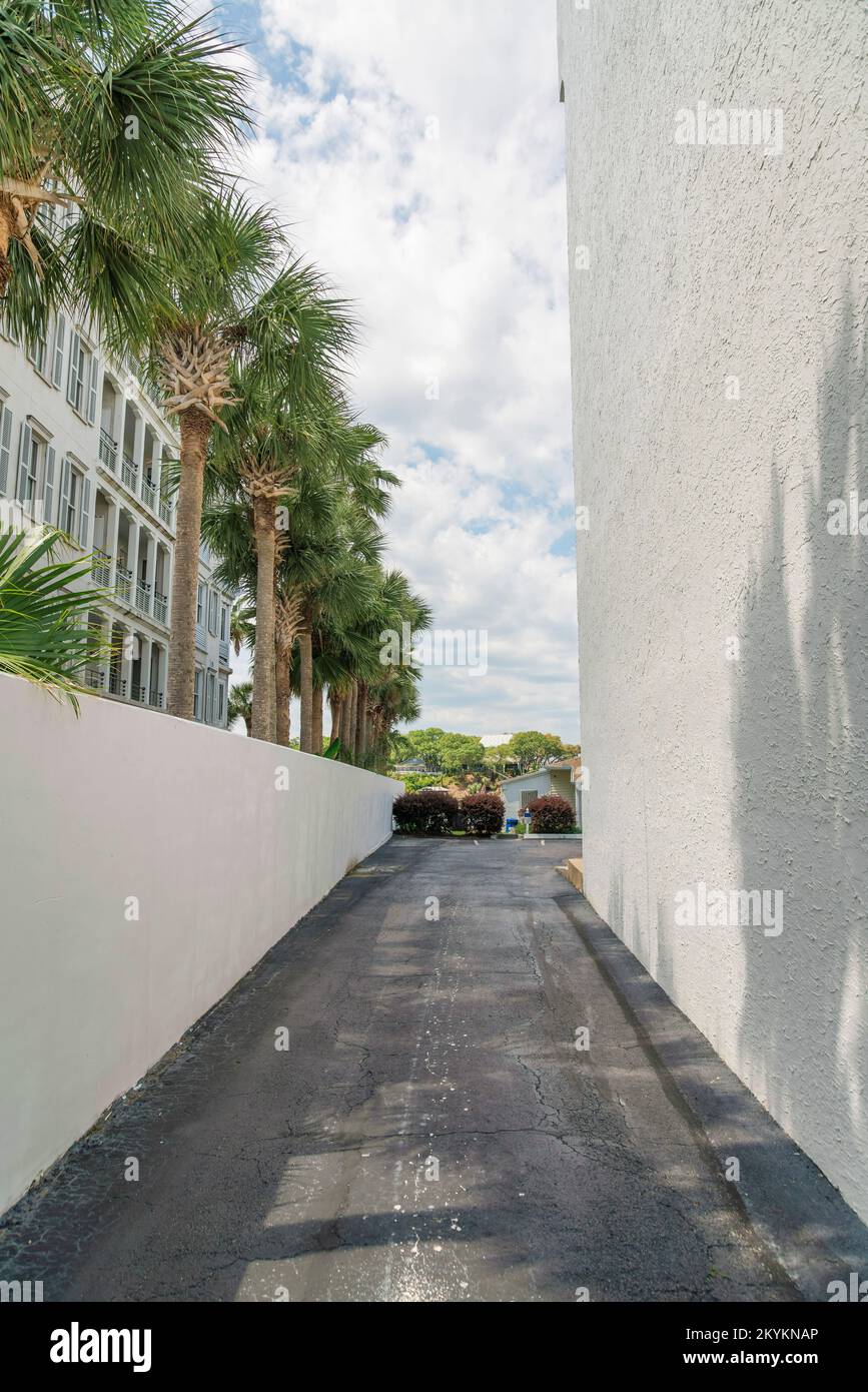 Destin, Florida- Alley driveway to the parking lot at the side of the ...