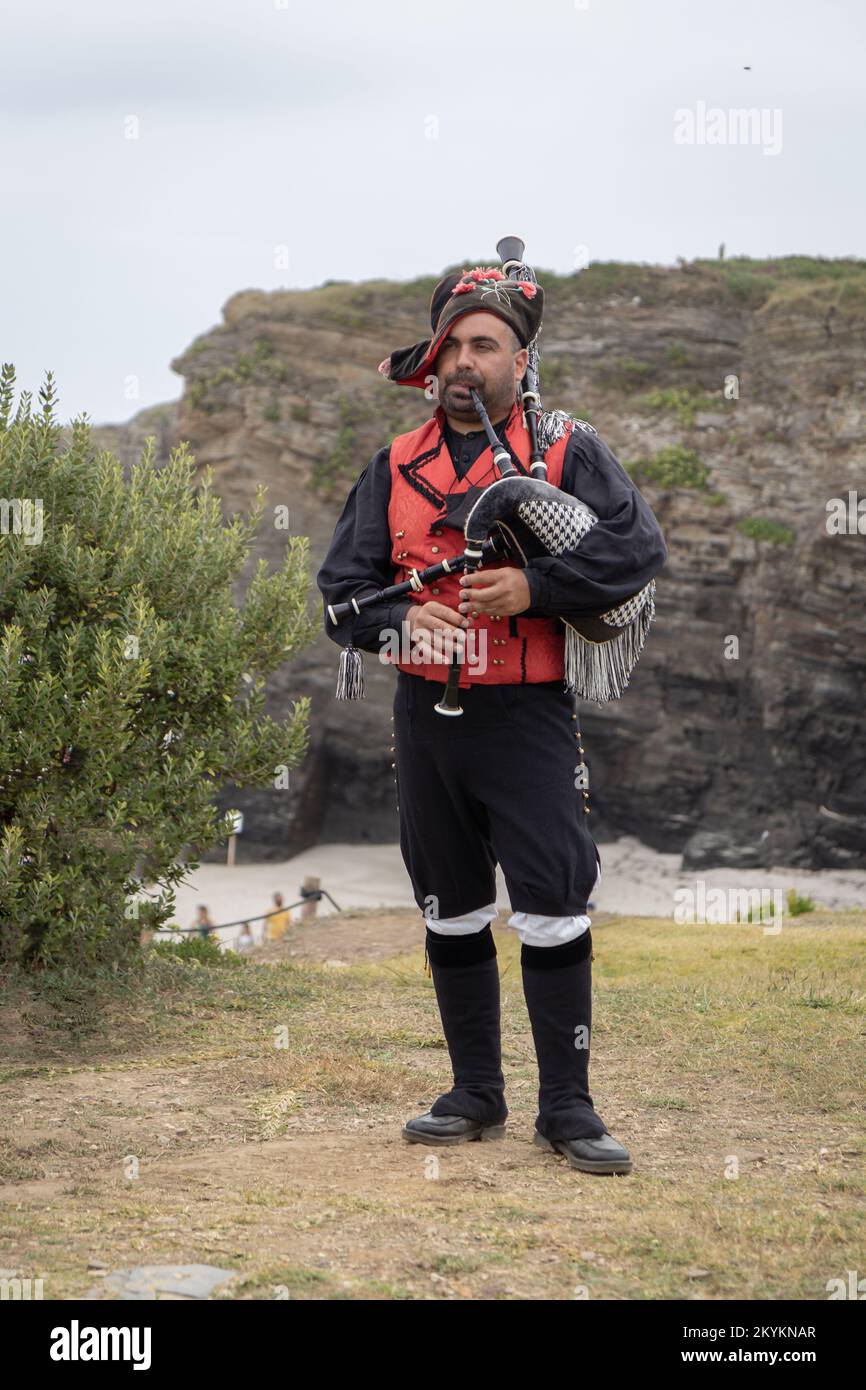 GALLEGO, SPAIN-AUGUST 11, 2021: Bagpiper busking with the Great ...