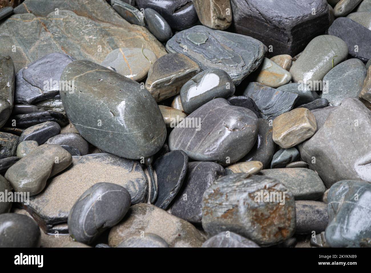 Sea pebbles close up background, copy space Stock Photo - Alamy