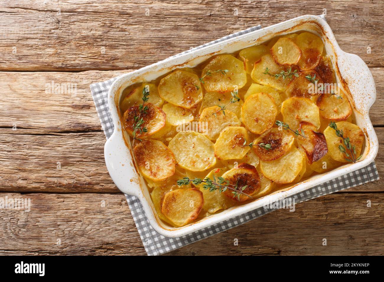 Scalloped potatoes, potato casserole with the addition of herbs, onion ...
