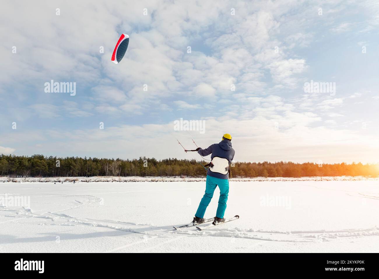 Panoramic view of many people friends enjoy riding kite surf board in ...