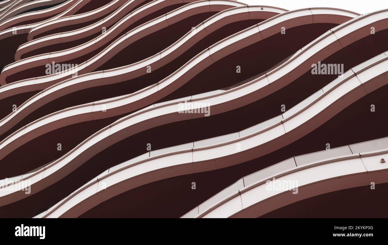 Modern building with wave shaped exterior. Modern future architecture ...