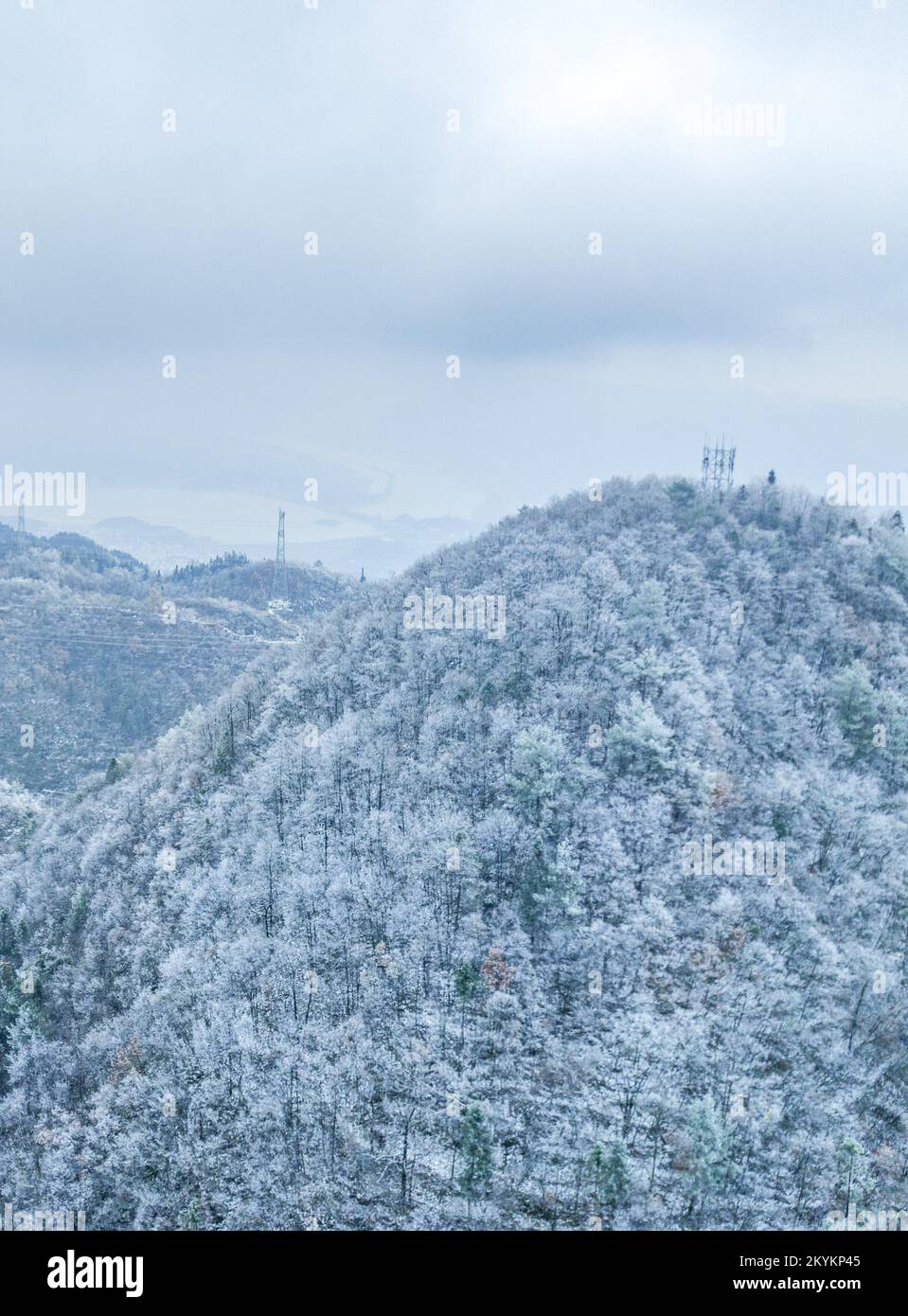 Aerial photo shows the snow scenery of Luo Jia Village, Maoping Town ...