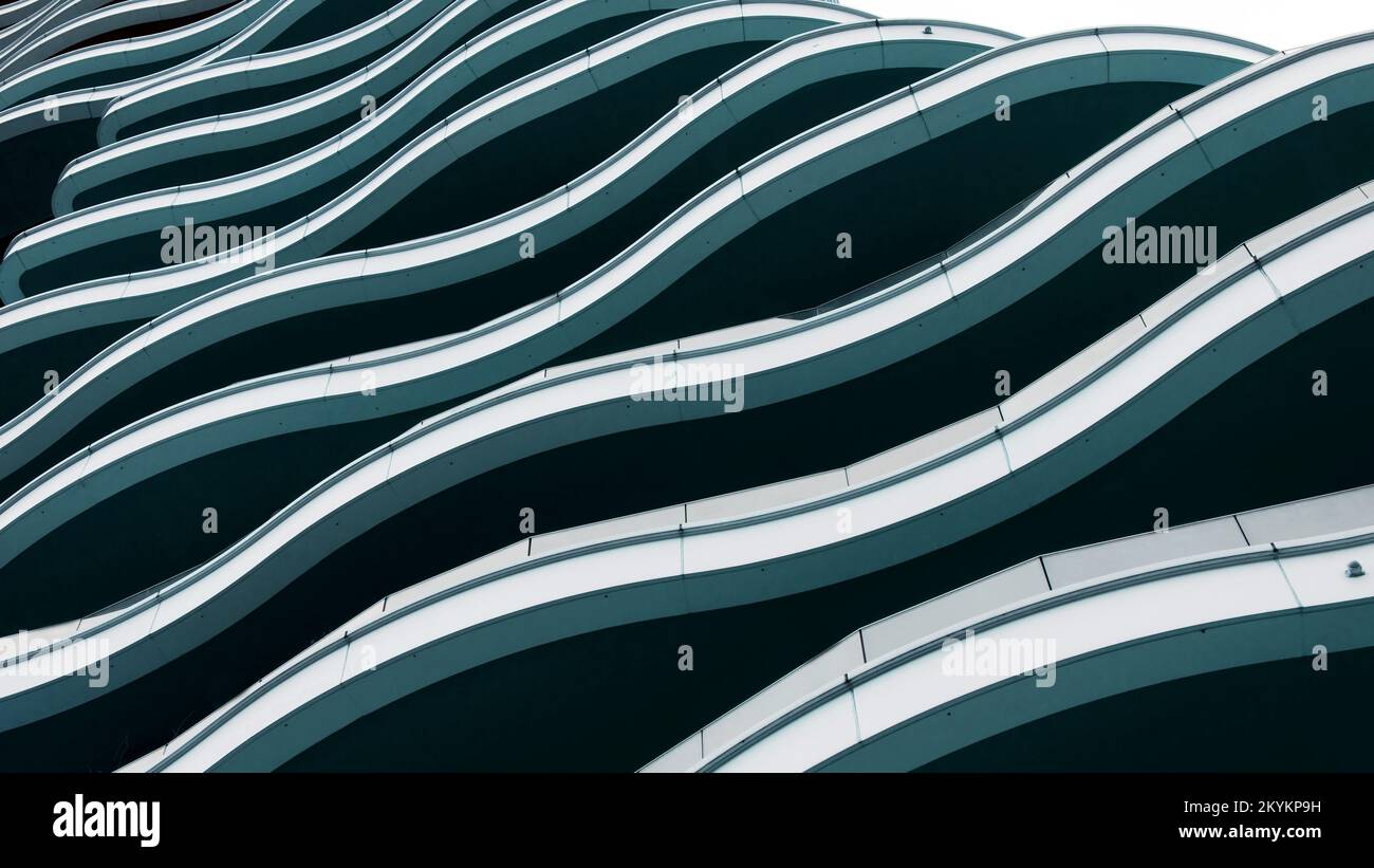 Modern building with wave shaped exterior. Modern future architecture ...