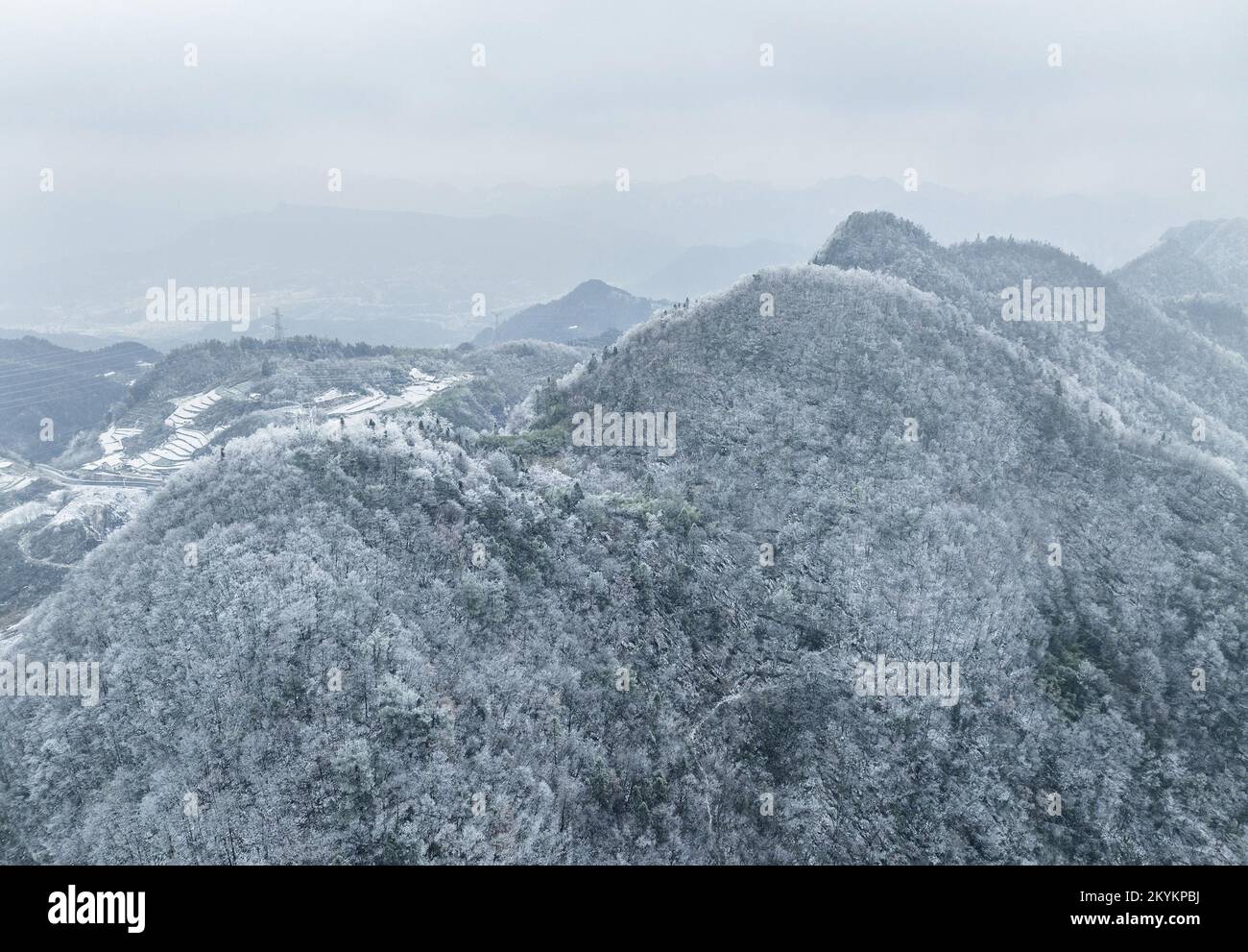 Aerial photo shows the snow scenery of Luo Jia Village, Maoping Town ...