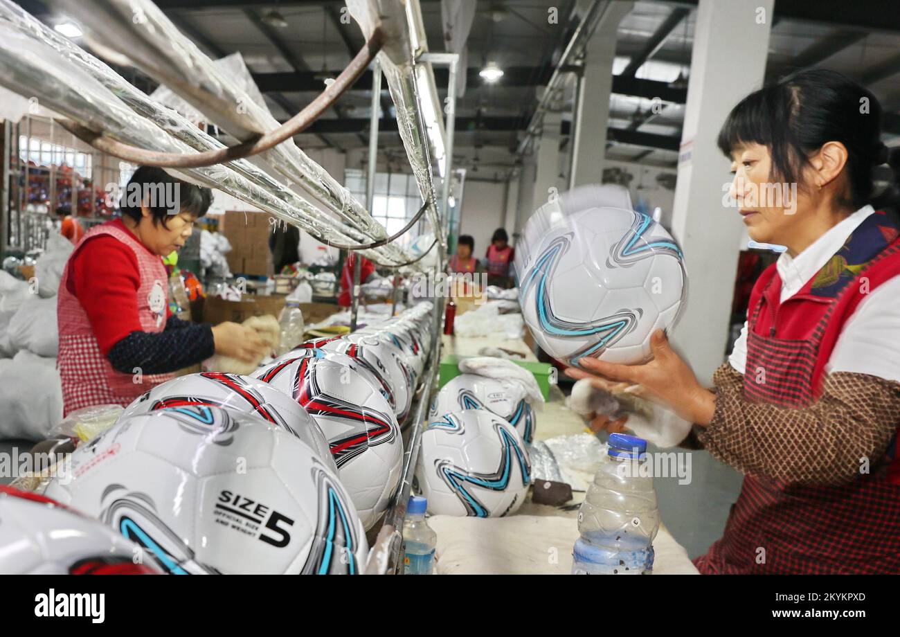 The busy working scene of a football enterprise Nantong Winner Sports ...