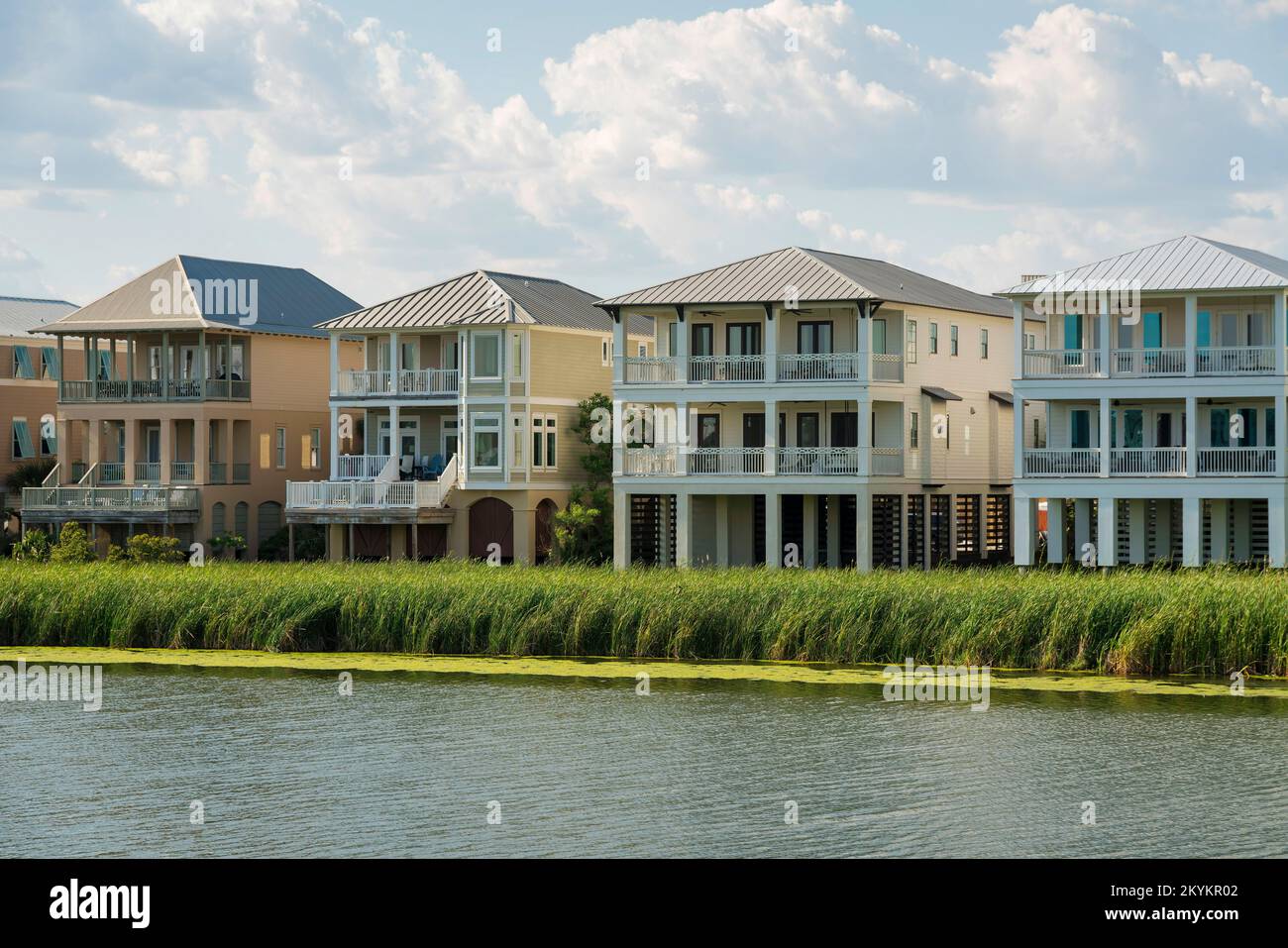 Destin, Florida- Row of three-storey houses with view decks and lake ...