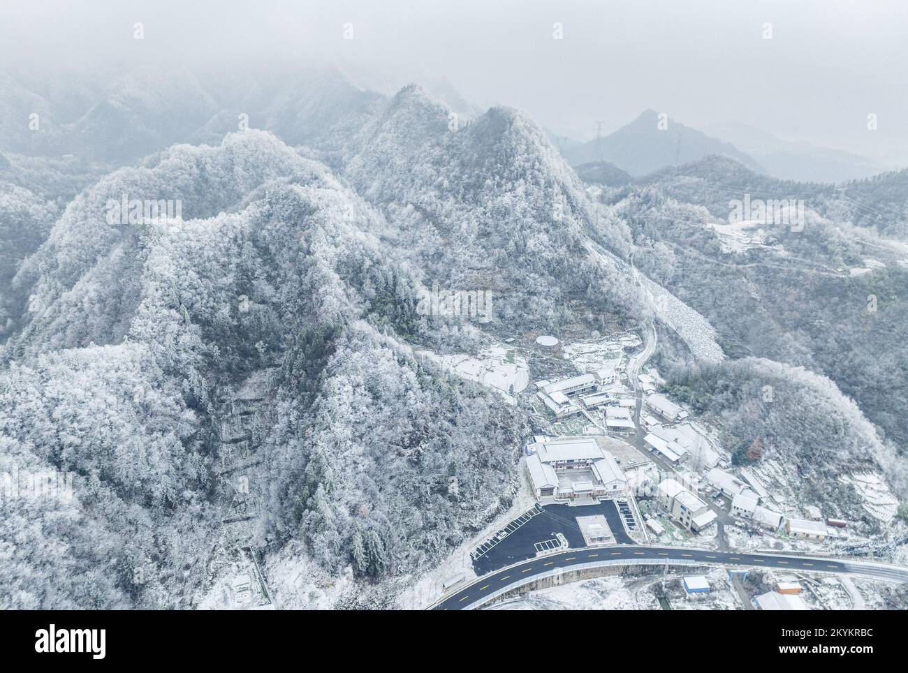 Aerial photo shows the snow scenery of Luo Jia Village, Maoping Town ...
