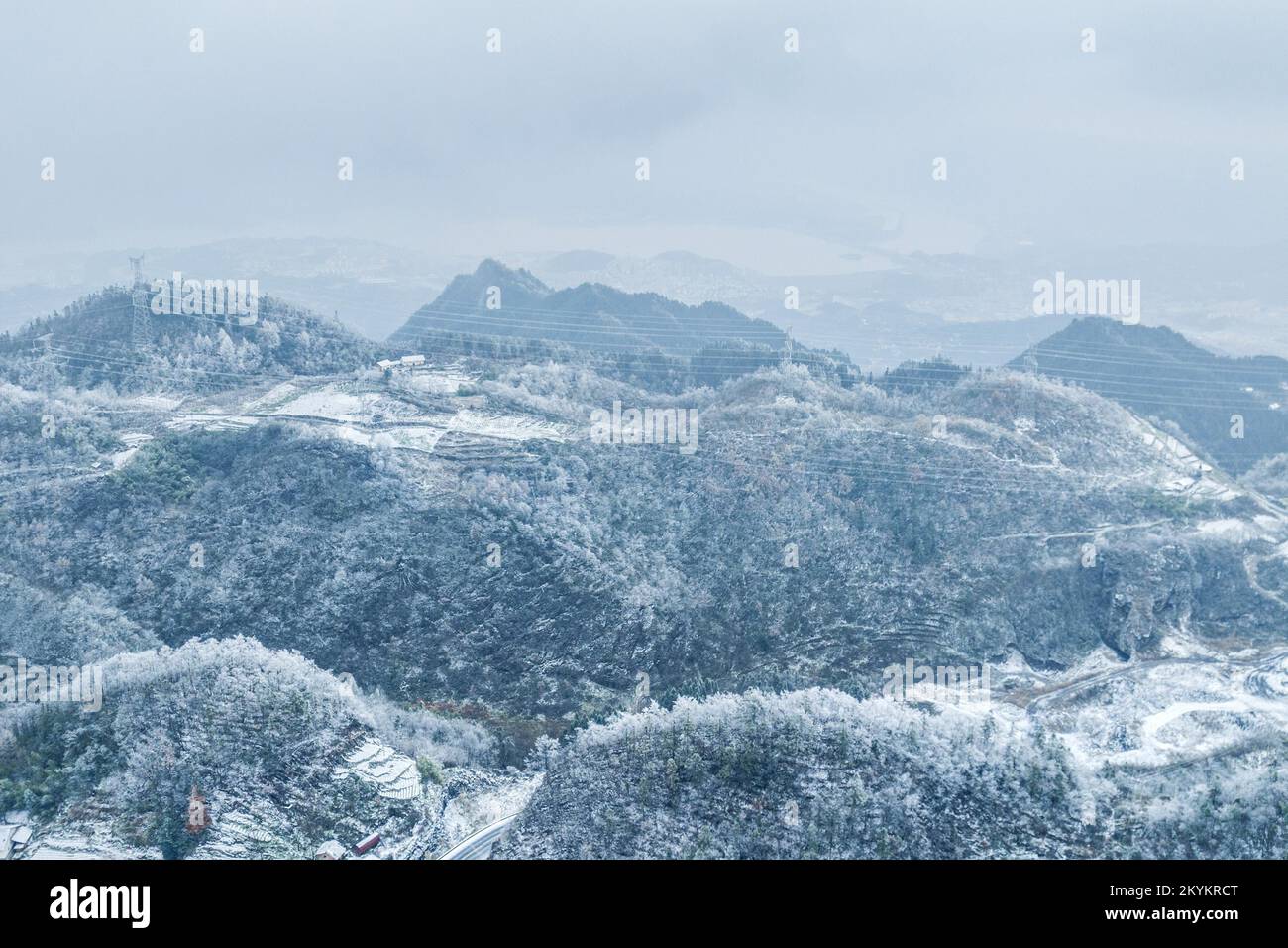 Aerial photo shows the snow scenery of Luo Jia Village, Maoping Town ...