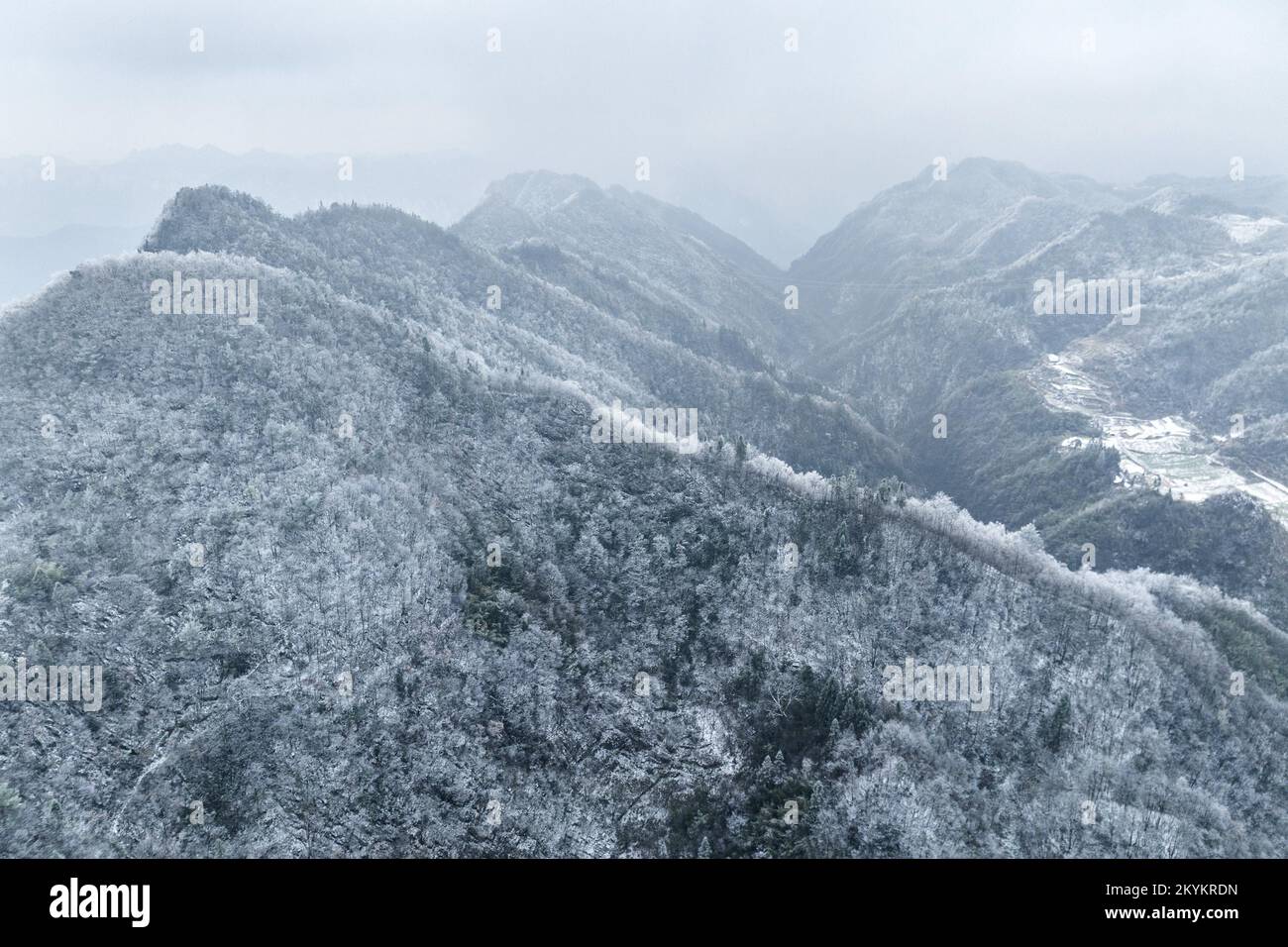 Aerial photo shows the snow scenery of Luo Jia Village, Maoping Town ...