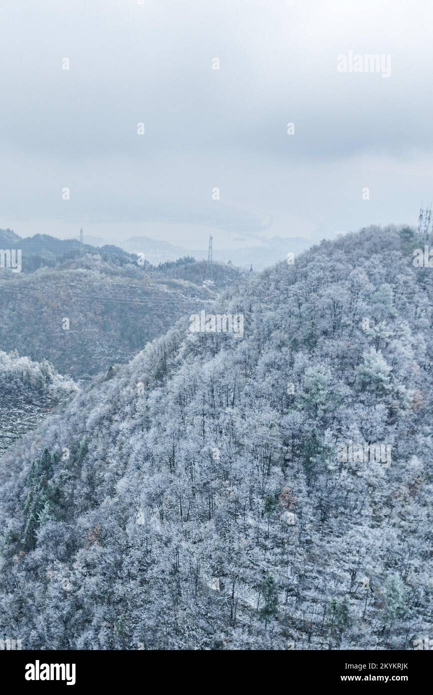 Aerial photo shows the snow scenery of Luo Jia Village, Maoping Town ...