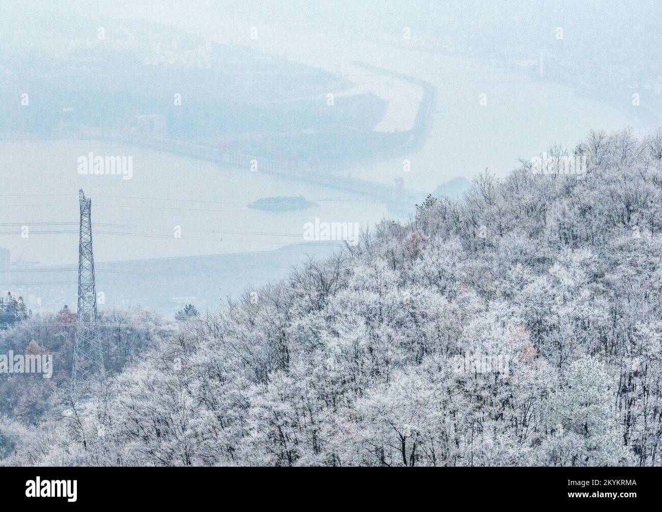 Aerial photo shows the snow scenery of Luo Jia Village, Maoping Town ...