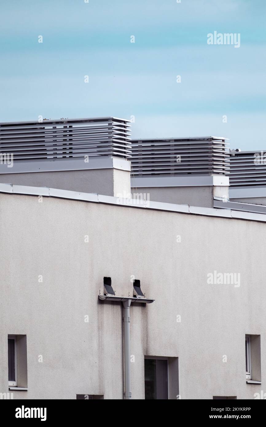House outdoor roof ventilation and rain drainage units on sunny day on ...
