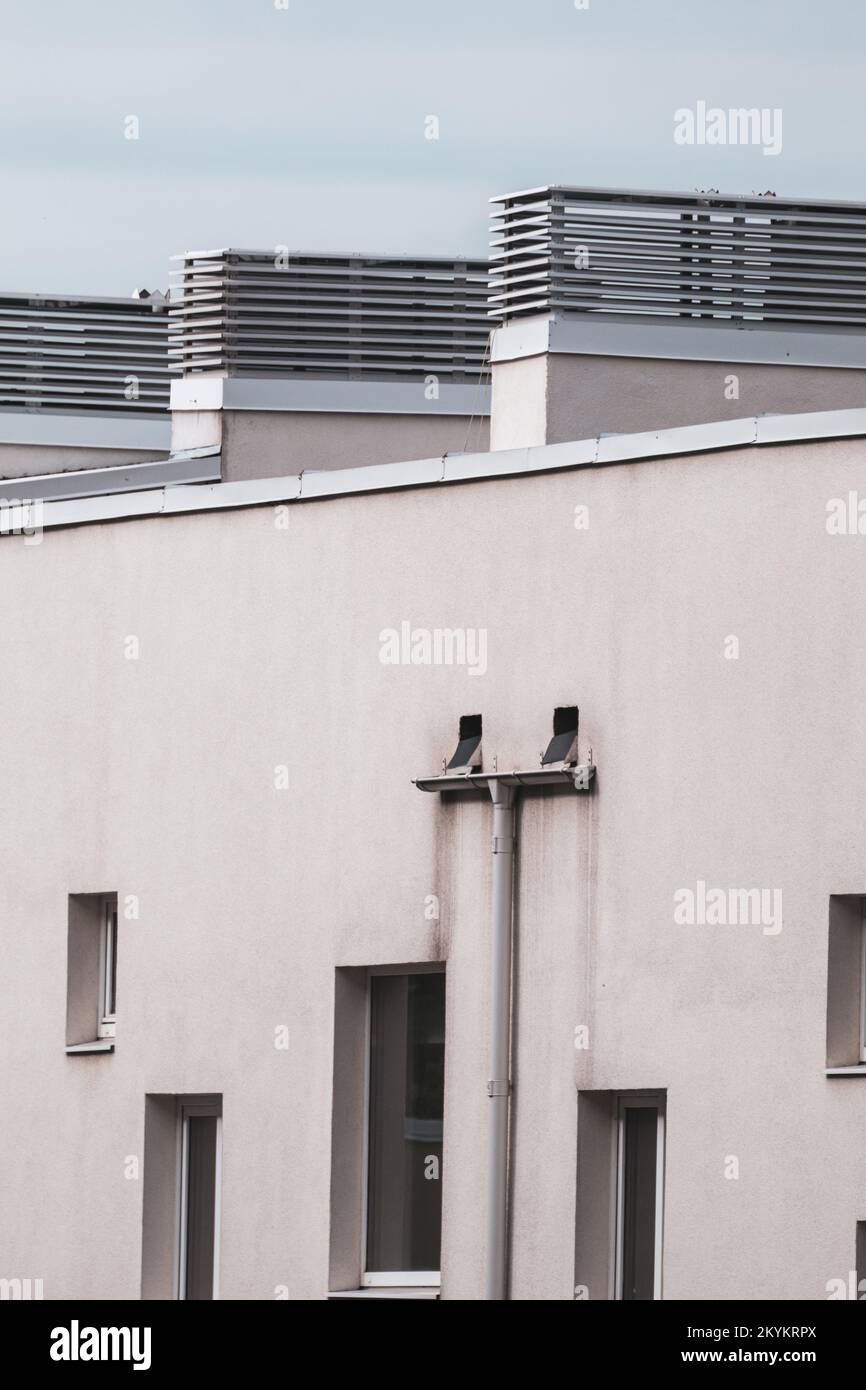 House outdoor roof ventilation and drainage units on sunny day ...