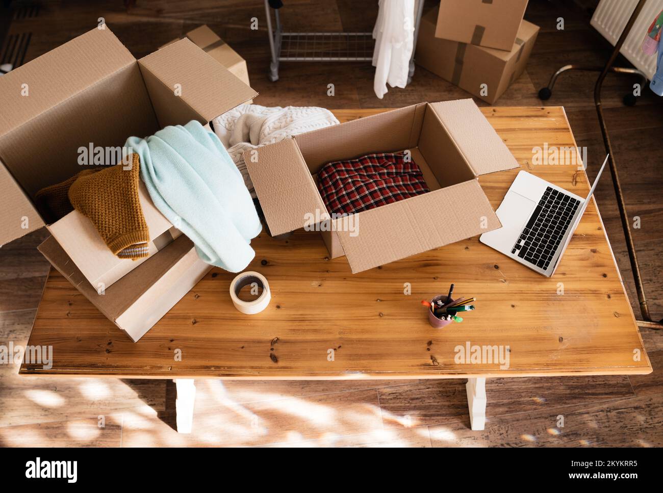 Pre owned clothes resale or donation Stock Photo - Alamy