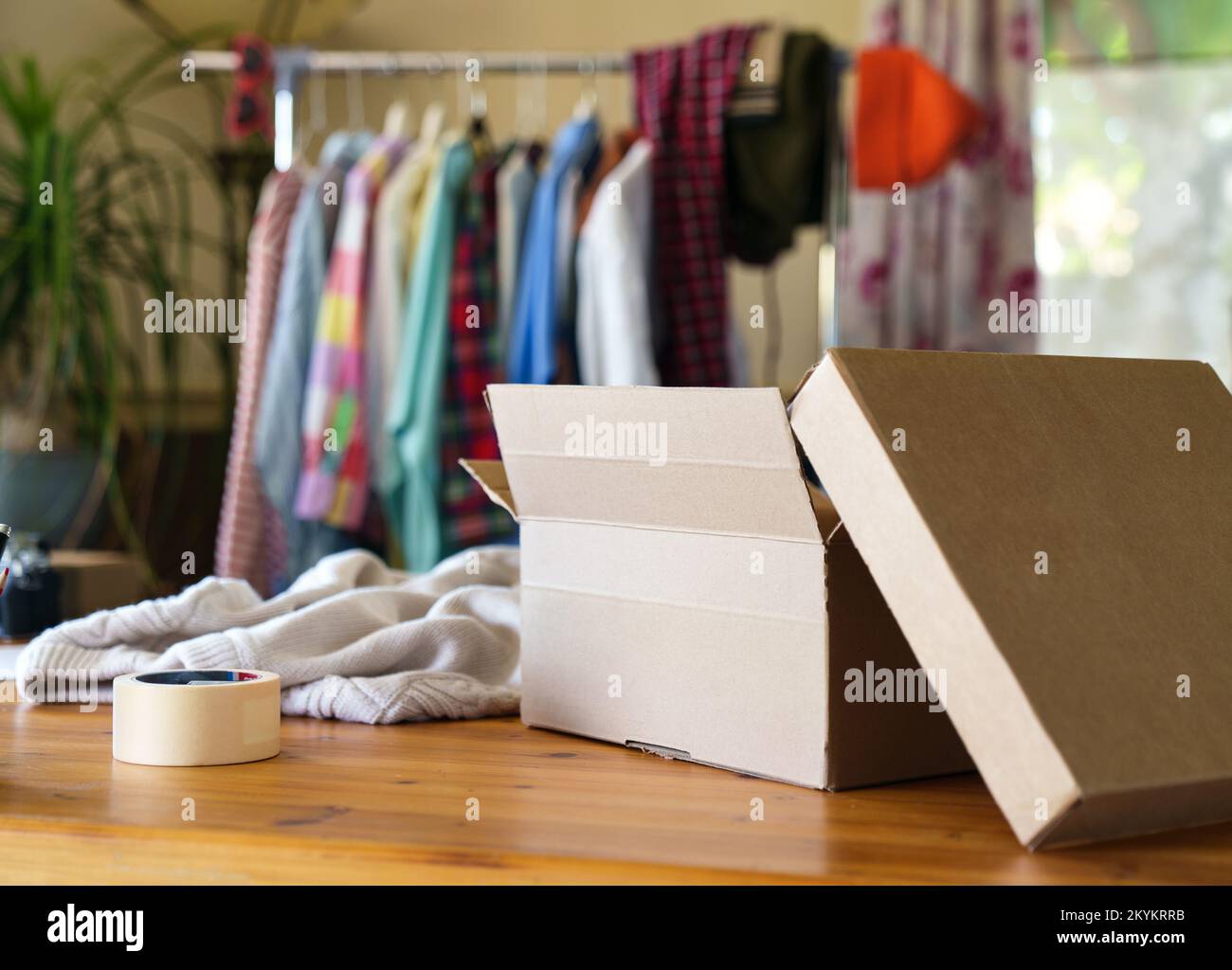 Pre owned clothes resale or donation Stock Photo - Alamy