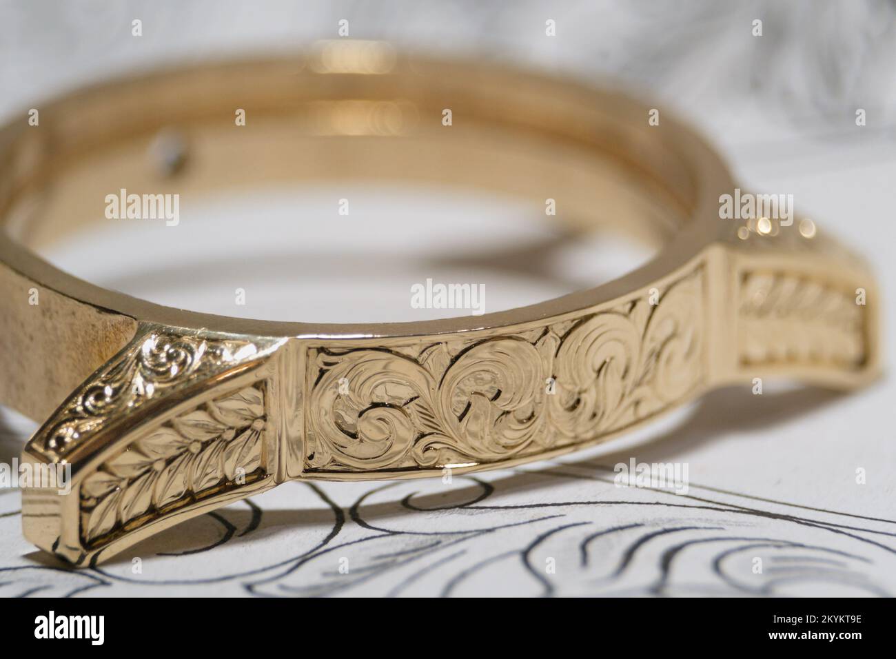 Close-up, golden blank for production of pocket watches, sketch and ...