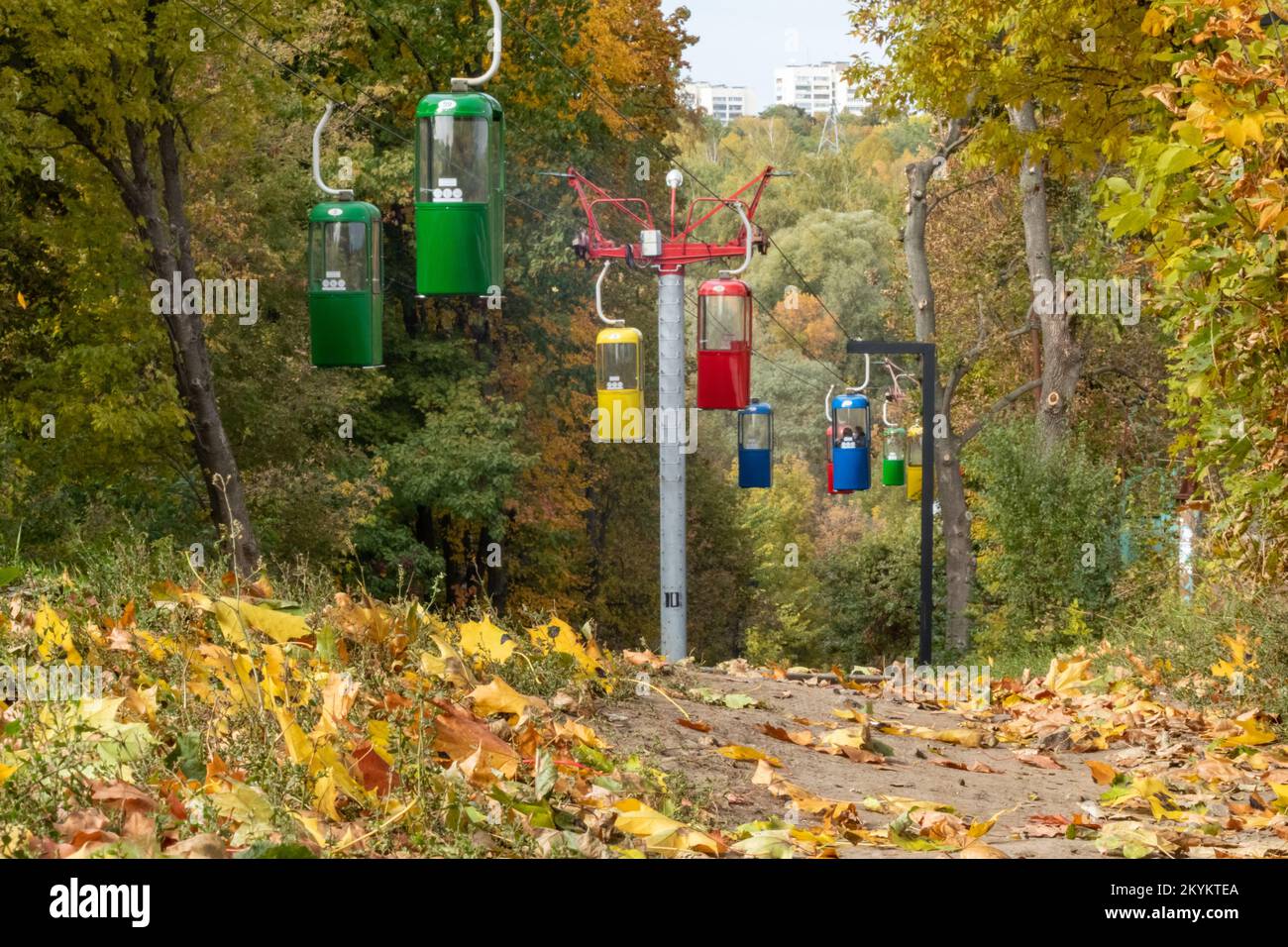 Colorful cableway transport cabins in Kharkiv city recreation park with ...