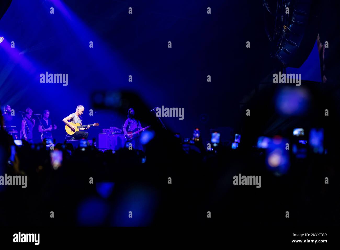 Sting, real name Gordon Sumner, live performance on stage. Bass player ...