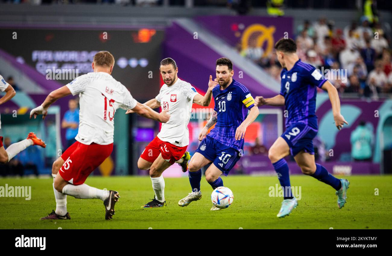 Doha, Qatar. 30th Nov, 2022. Lionel Messi (Arg), Grzegorz Krychowiak ...
